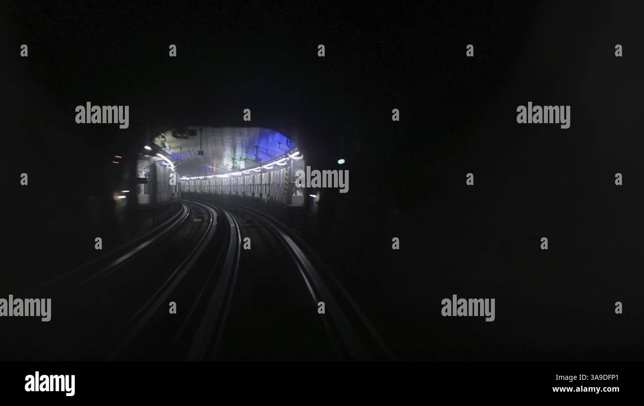 View from driver window of Paris metro subway and station lights around ...