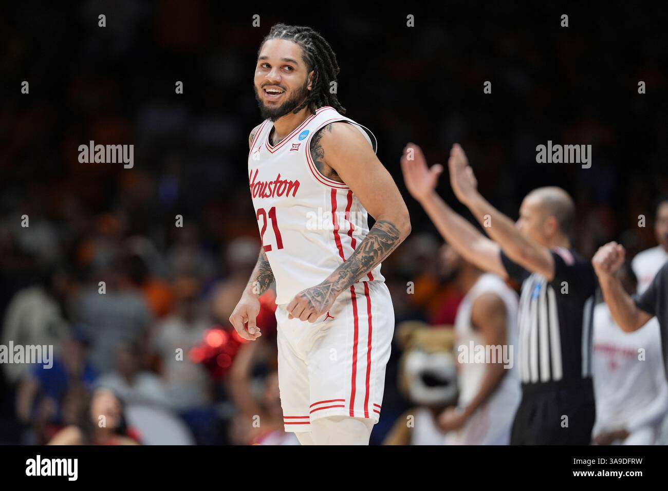 Houston's Emanuel Sharp celebrates during the second half in the Elite ...