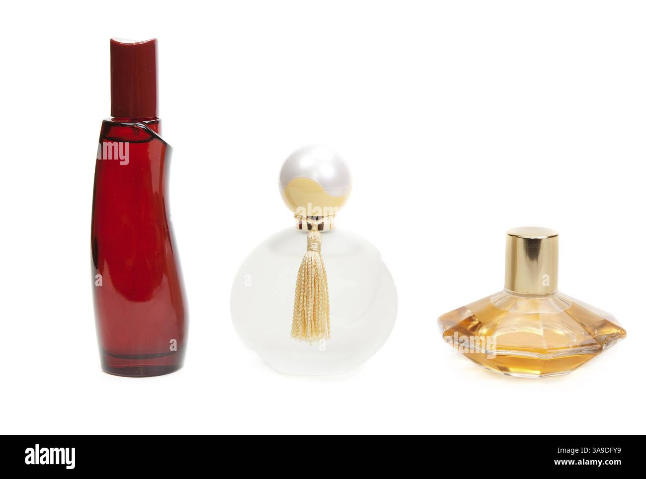 Three perfume bottle isolated on white background Stock Photo - Alamy