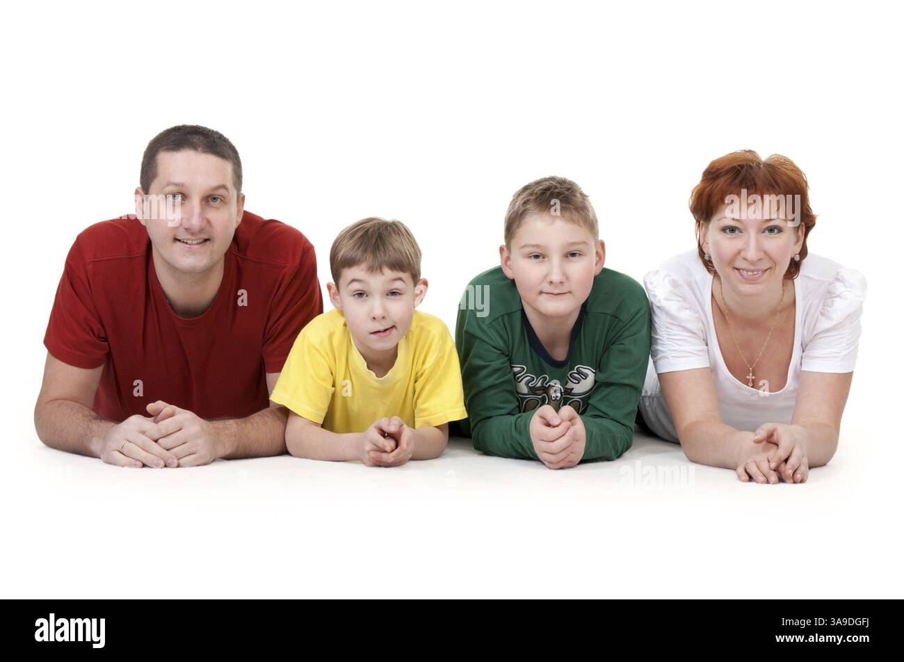 Family of four on the floor on a white background Stock Photo - Alamy