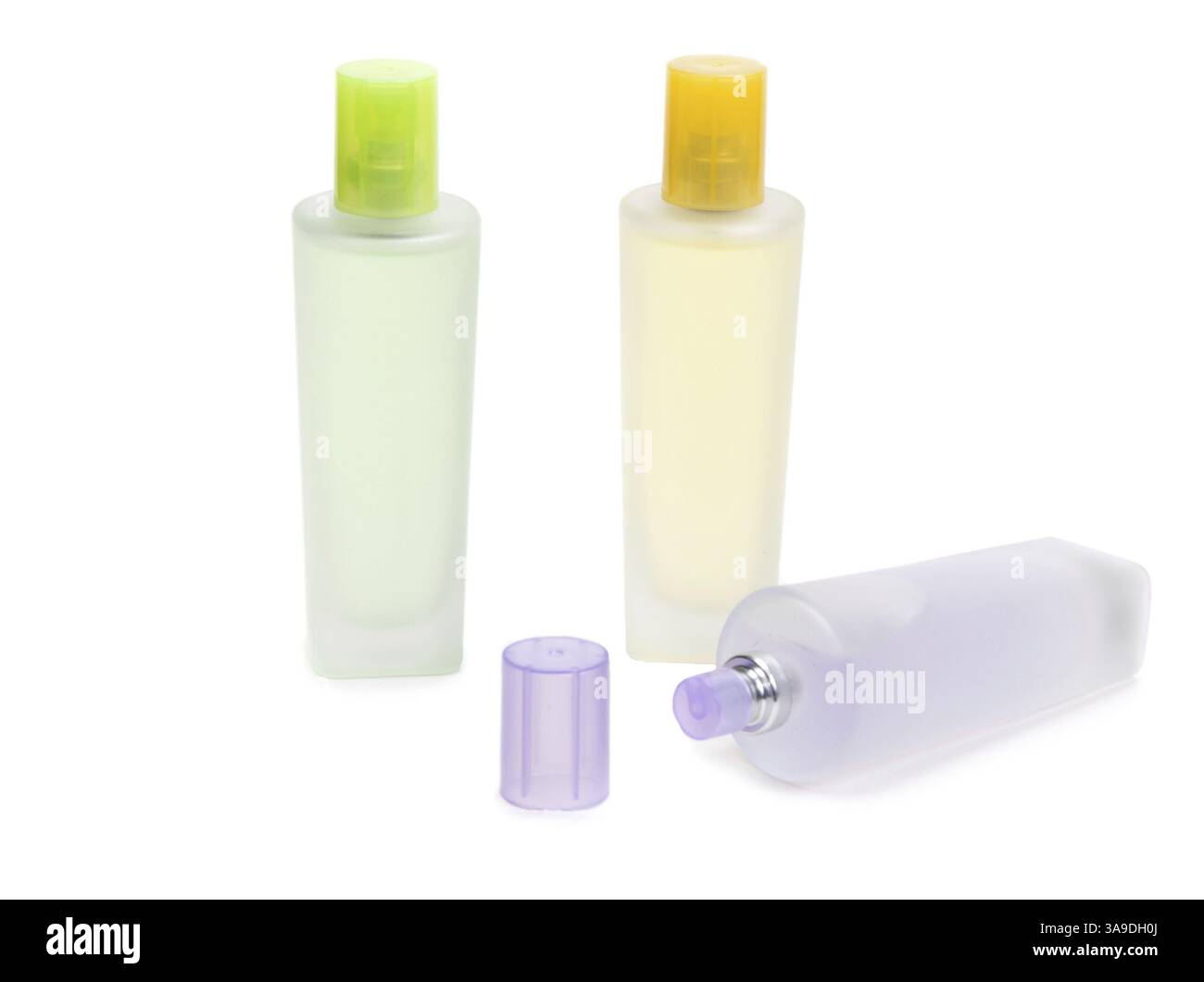 Three perfume bottle isolated on white background Stock Photo - Alamy