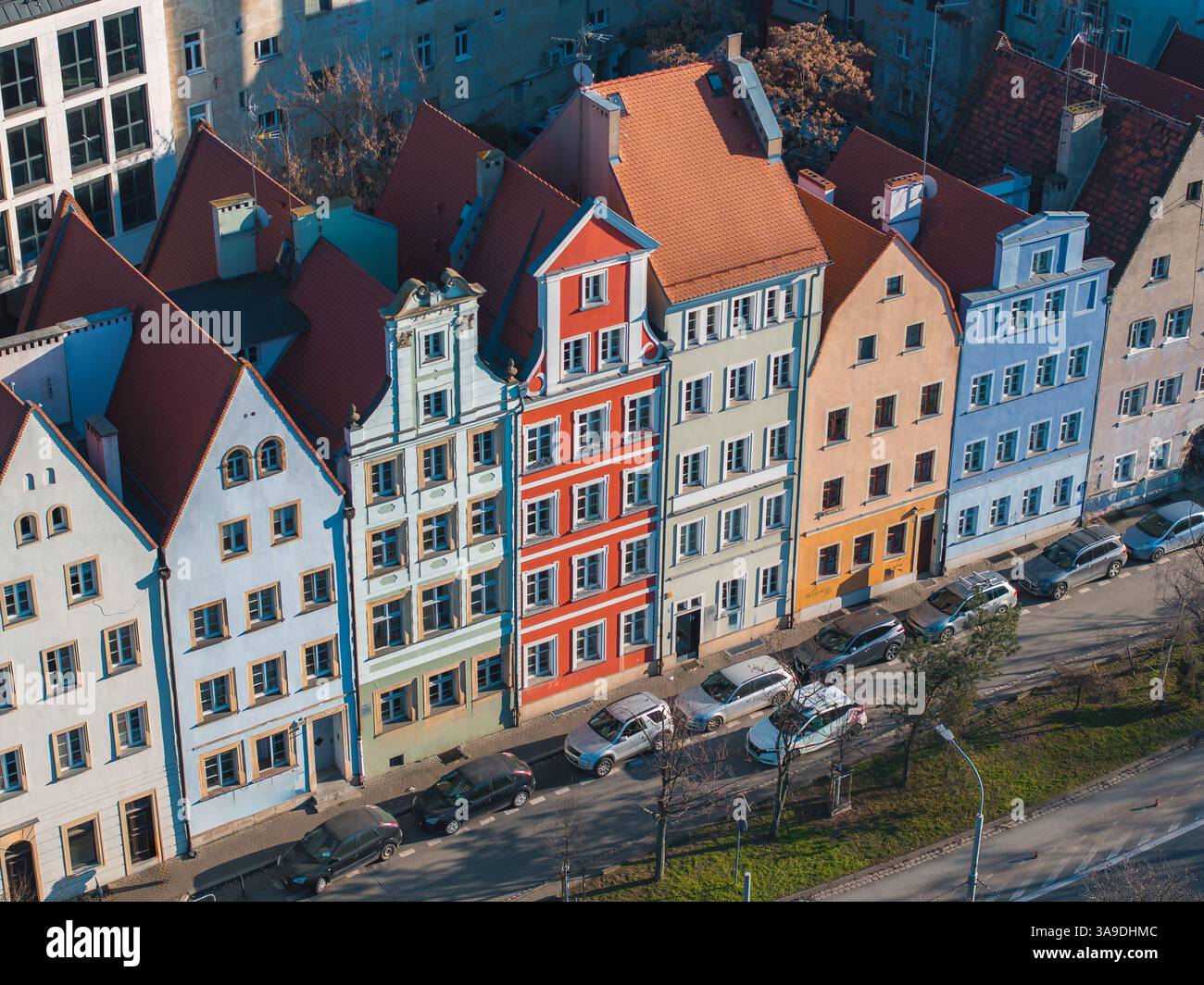 Colorful Historic Townhouses in Wroclaw, Poland with Modern Backdrop ...