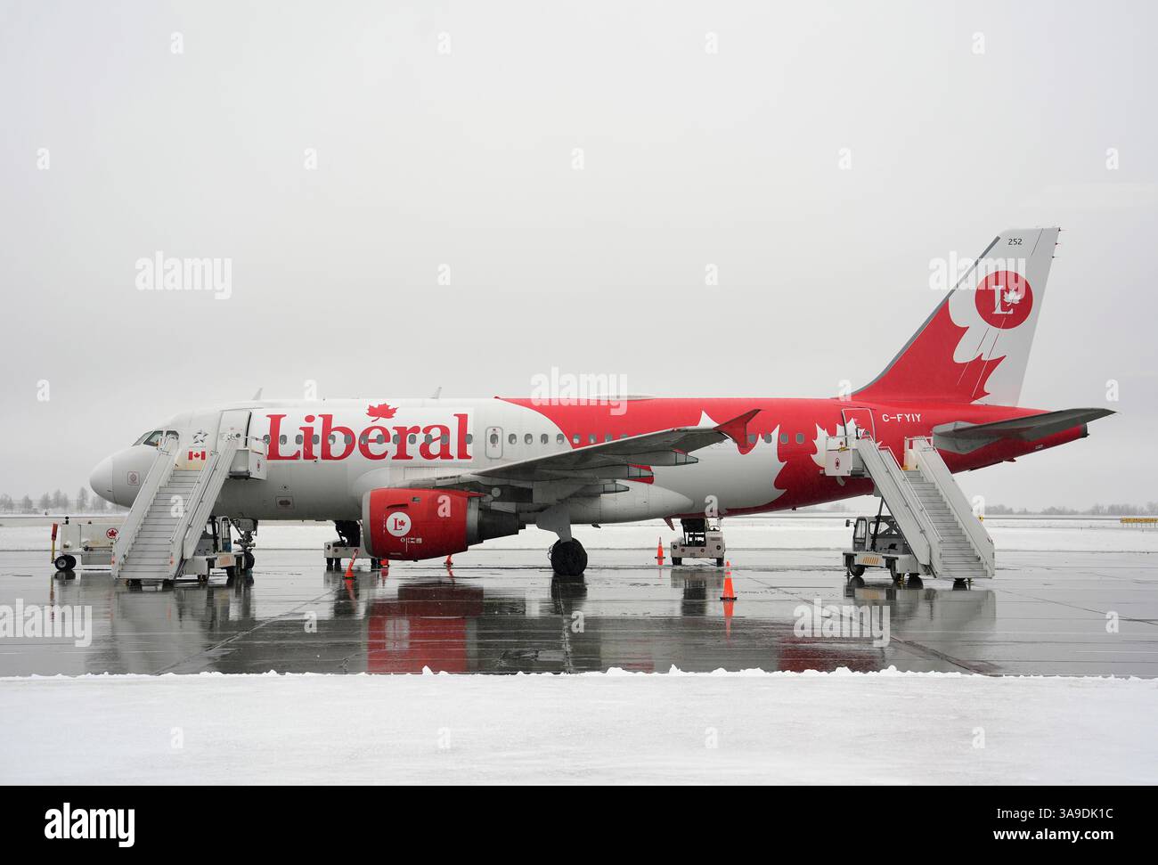 Liberal leader Mark Carney's campaign plane is seen at the airport ...