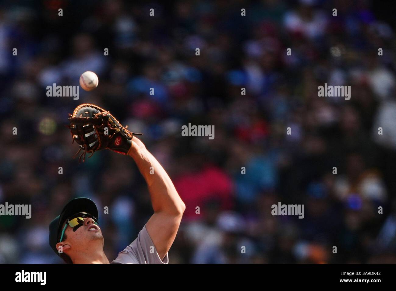 Athletics first baseman Tyler Soderstrom catches a fly ball for an out ...