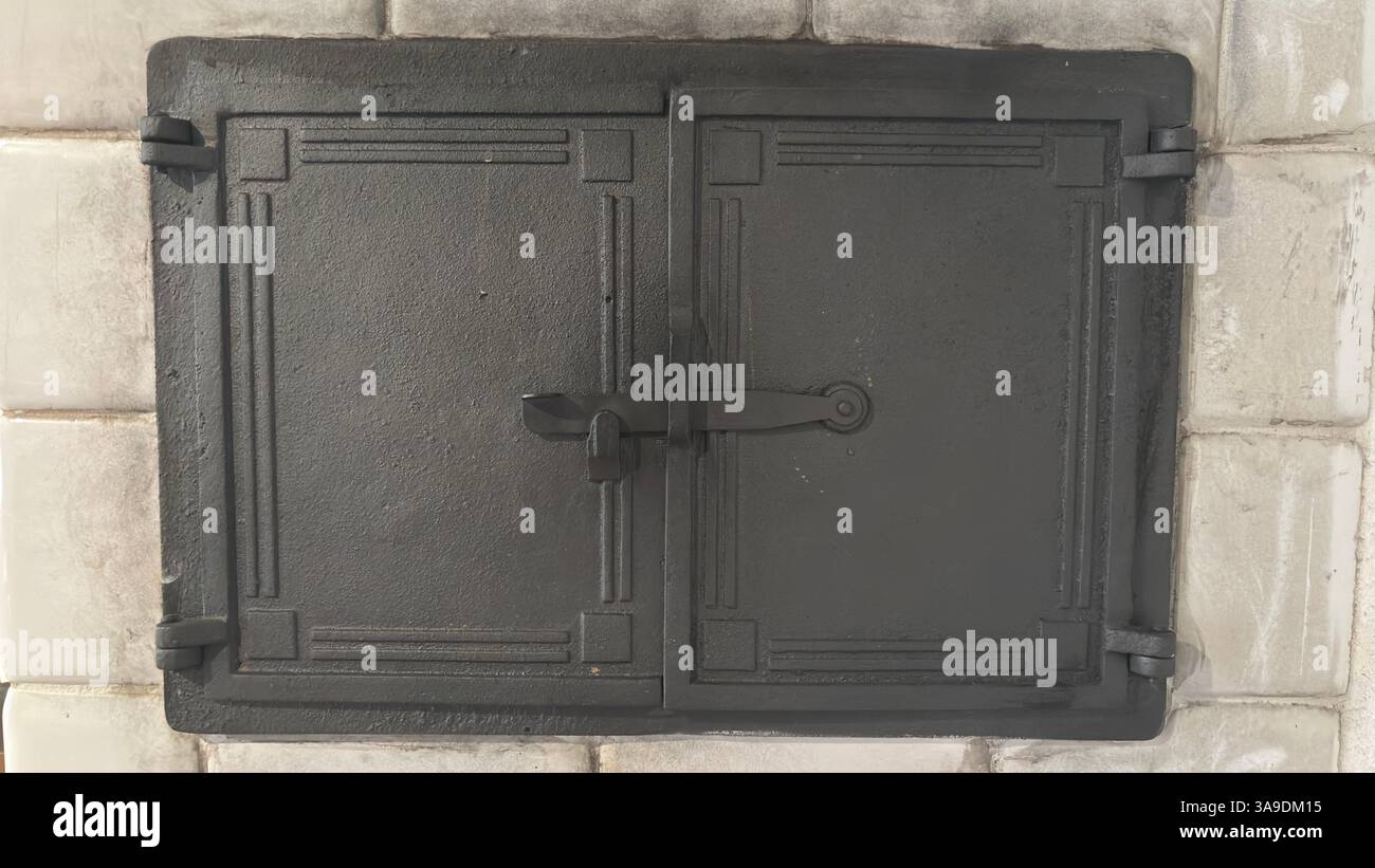 Cast iron doors. Interior fittings. Oven door. Vintage style Stock ...