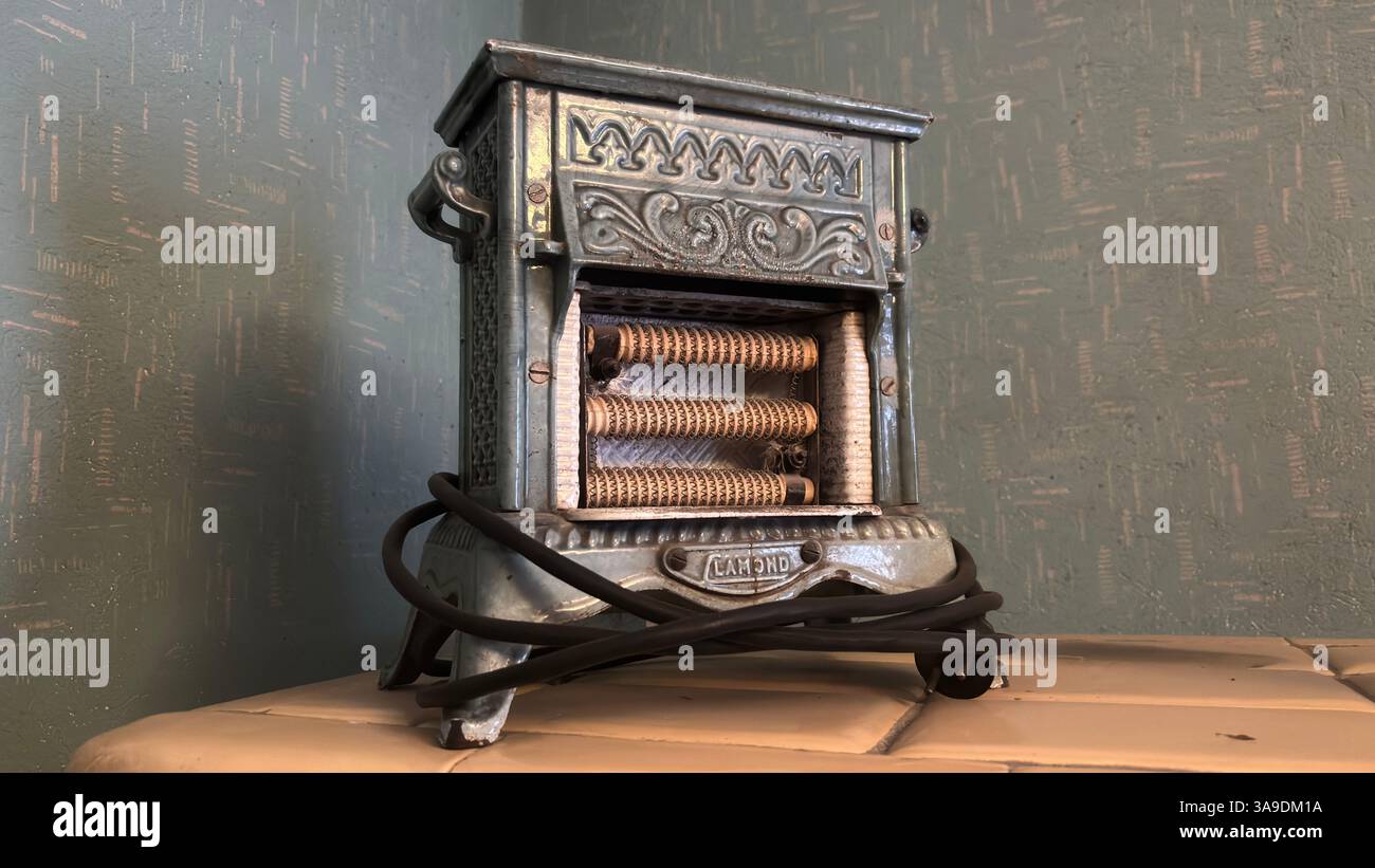 Vintage old electric heater fire. Cast iron decorative Soviet era retro ...