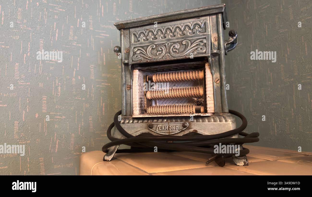 Vintage old electric heater fire. Cast iron decorative Soviet era retro ...