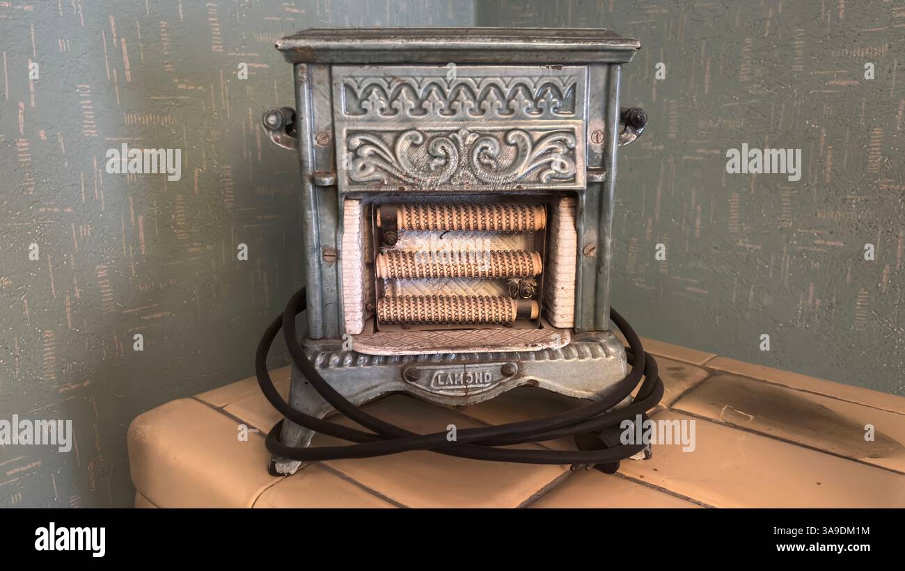 Vintage old electric heater fire. Cast iron decorative Soviet era retro ...