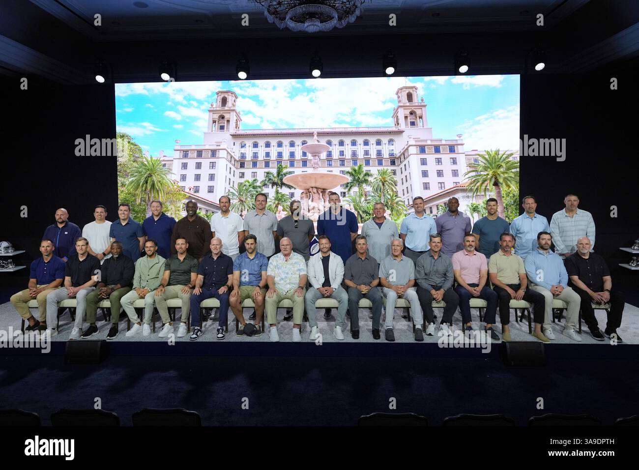 Head coaches pose for a group photograph at the NFL football annual ...