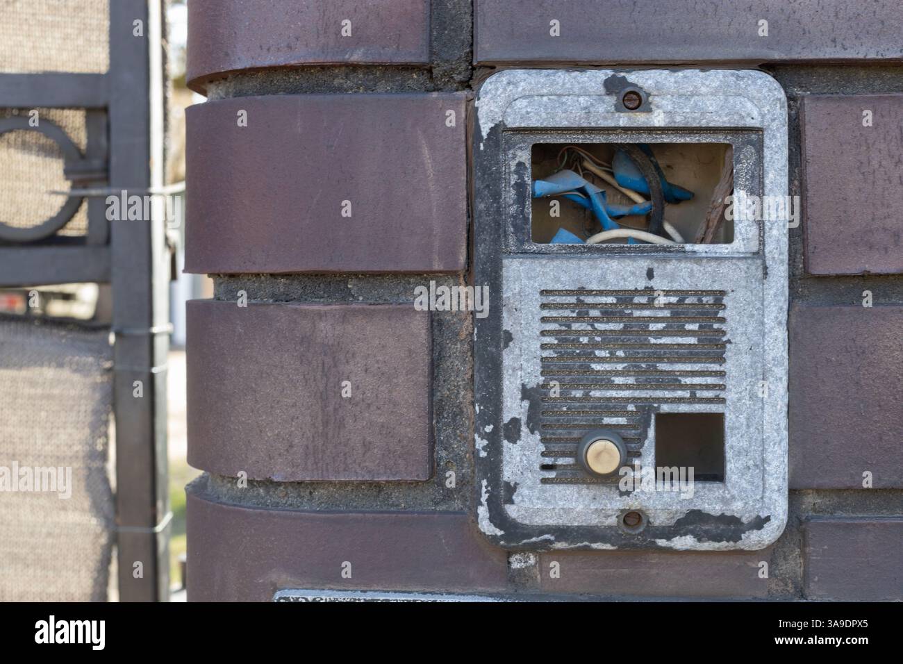 Old Damaged Intercom with Exposed Wires on Brick Wall Stock Photo - Alamy