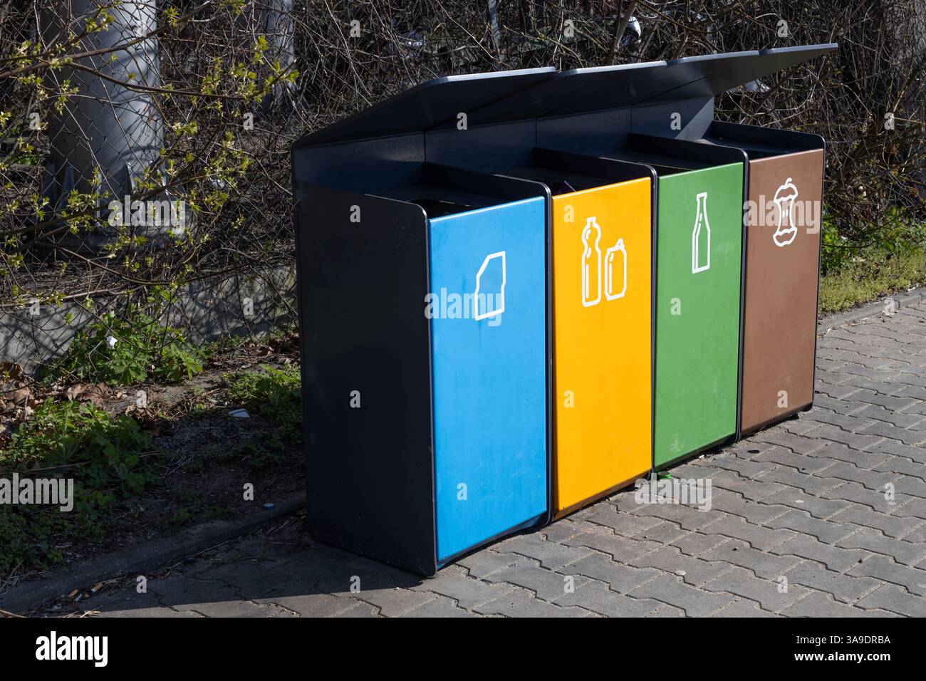 Color Coded Recycling Bins for Waste Segregation Stock Photo - Alamy