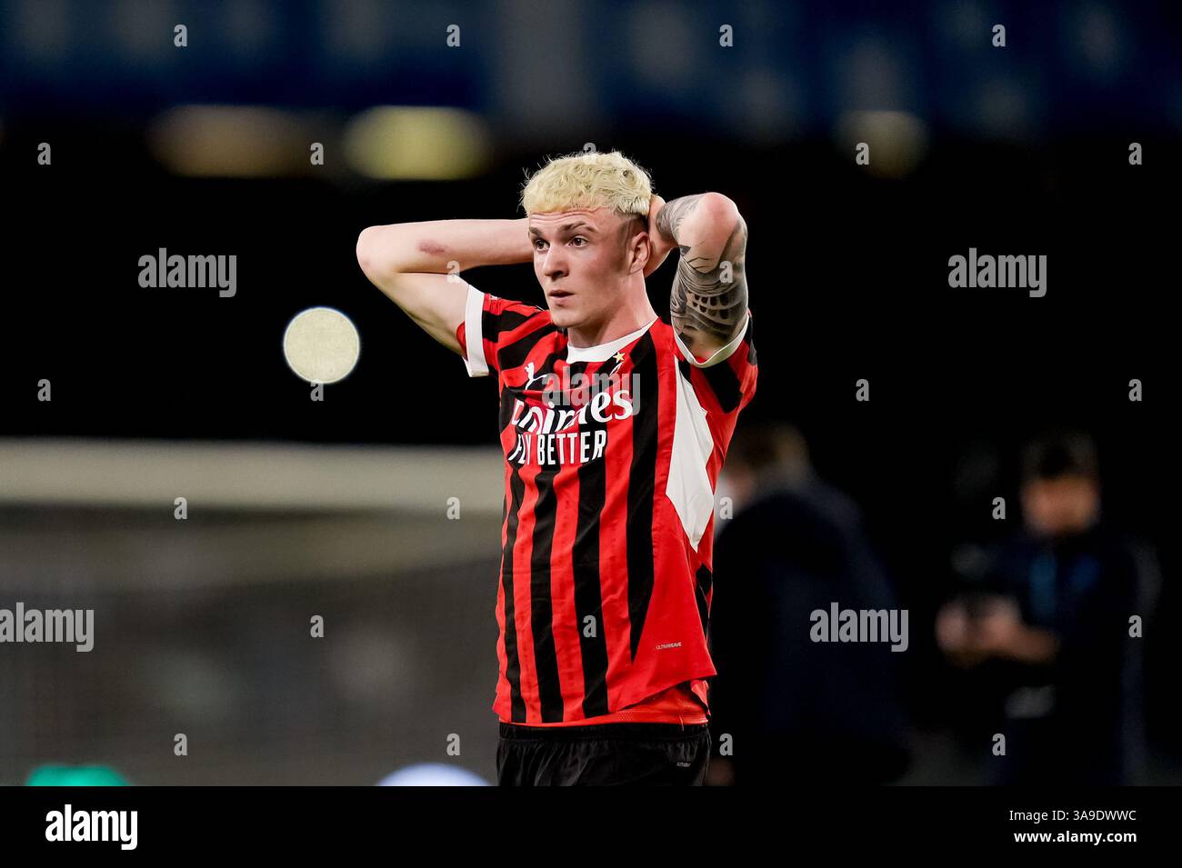Naples, Italy. 30th Mar, 2025. Alex Jimenez of AC Milan looks dejected ...