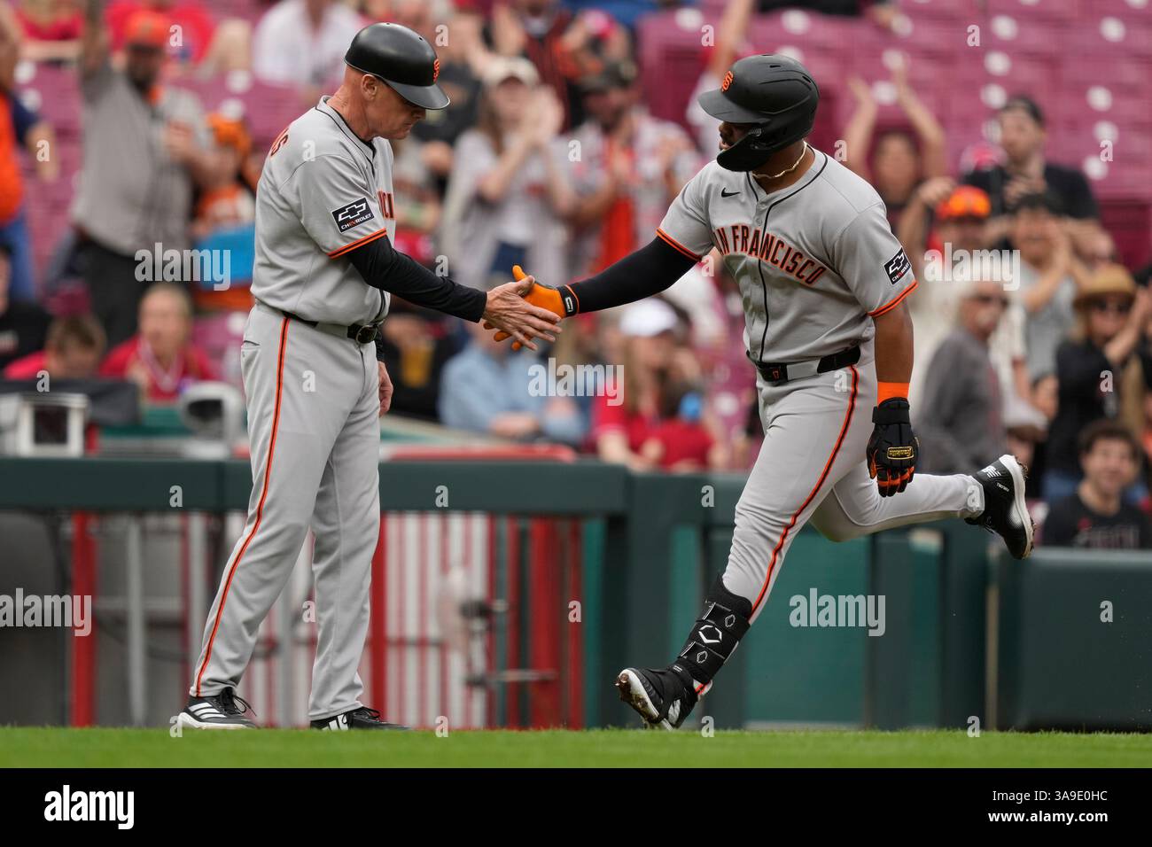 San Francisco Giants' Heliot Ramos, right, celebrates with third base ...