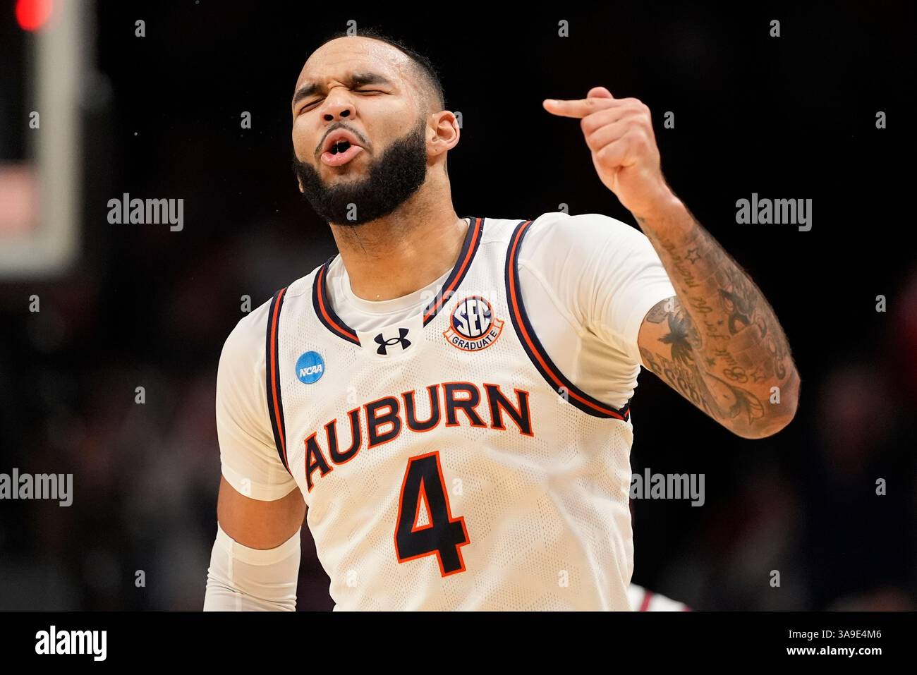 Auburn forward Johni Broome (4) reacts to his basket against Michigan ...