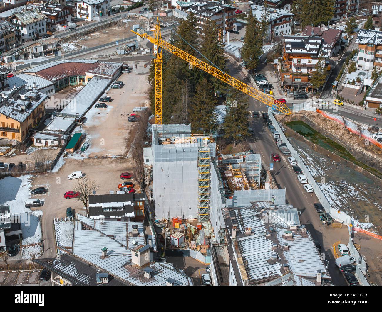 Aerial View of Construction Site and Alpine Architecture in Cortina ...