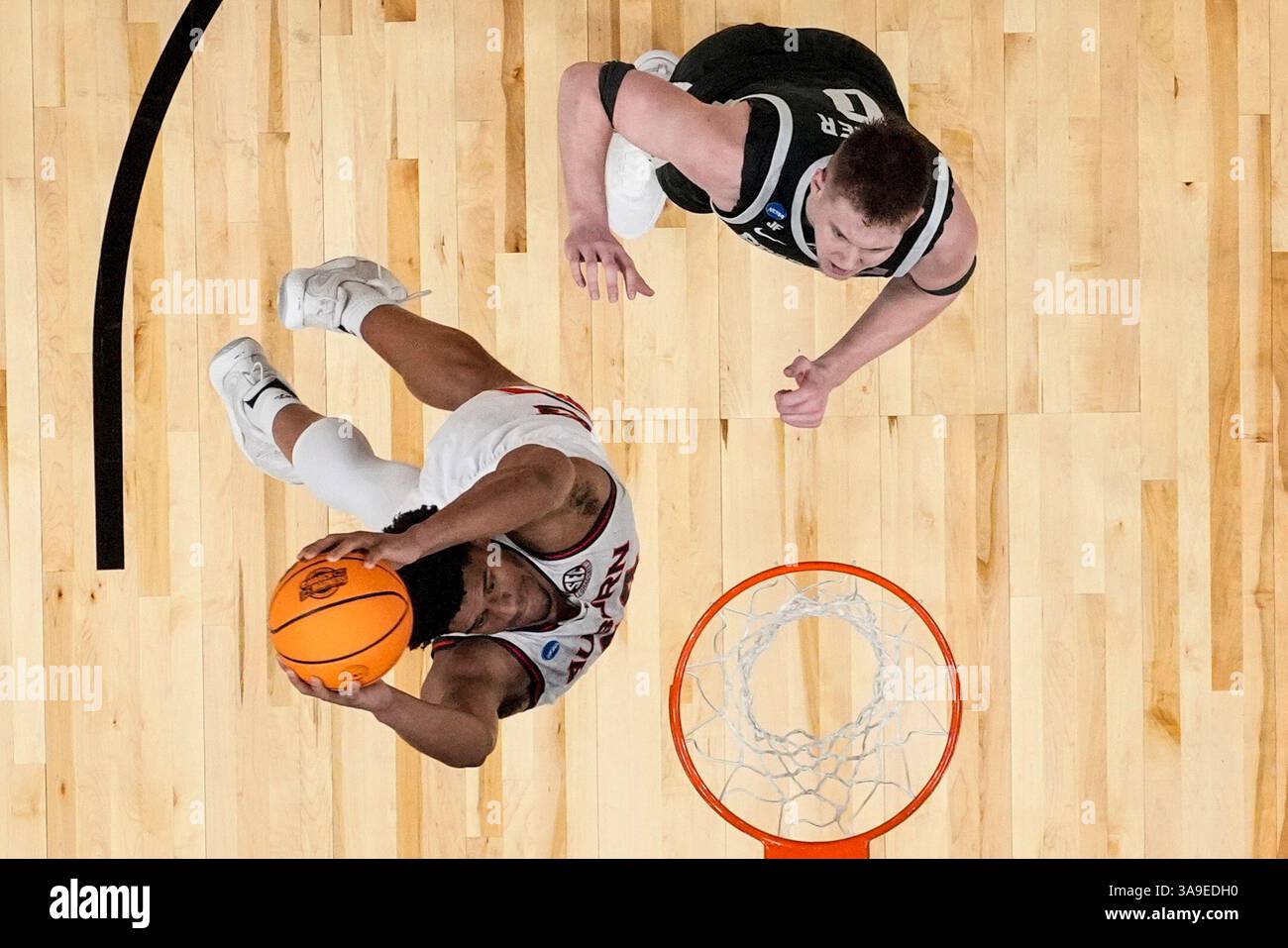 Auburn center Dylan Cardwell (44) dunks on Michigan State forward Jaxon ...