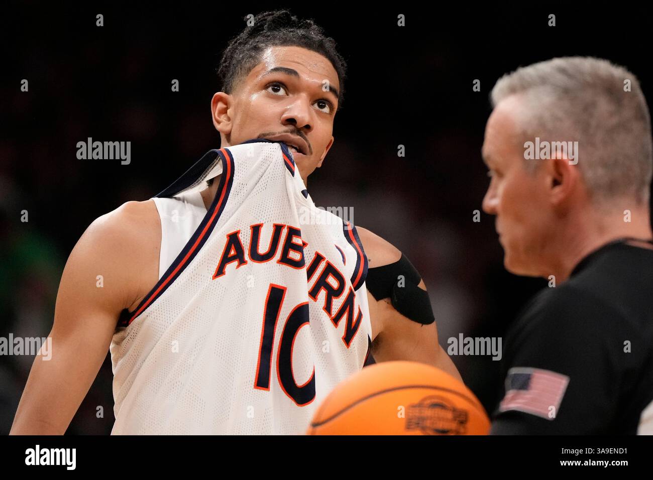 Auburn guard Chad Baker-Mazara (10) walks on the court against Michigan ...