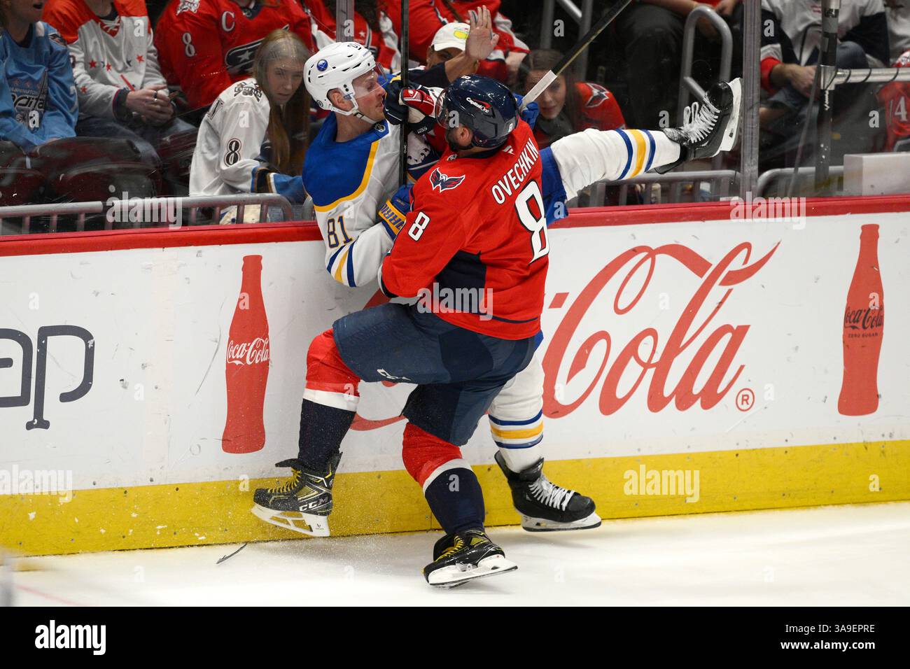 Washington Capitals left wing Alex Ovechkin (8) hits Buffalo Sabres ...