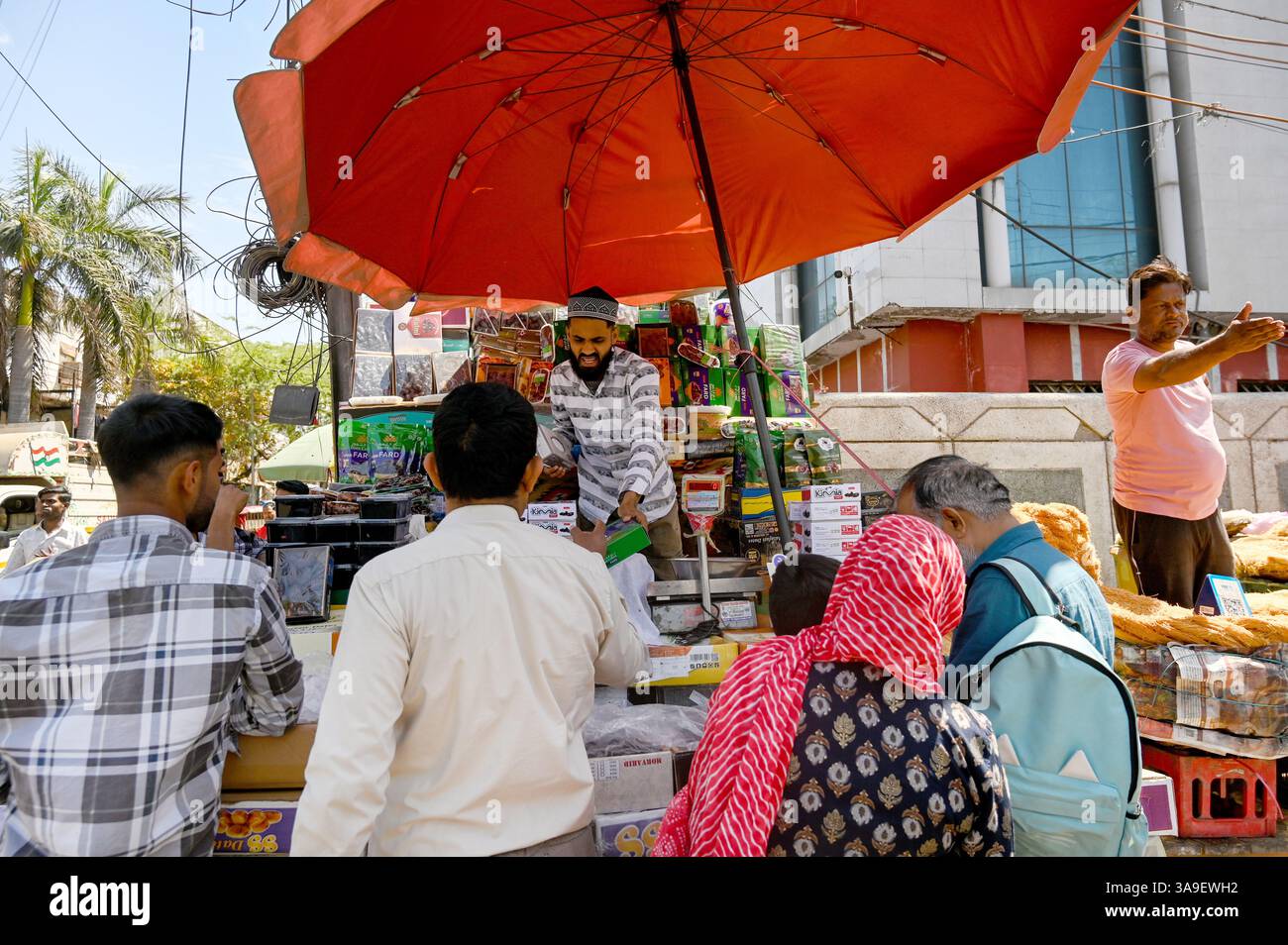 NOIDA, INDIA - MARCH 30: People shop at the Sector 8 market on the eve ...