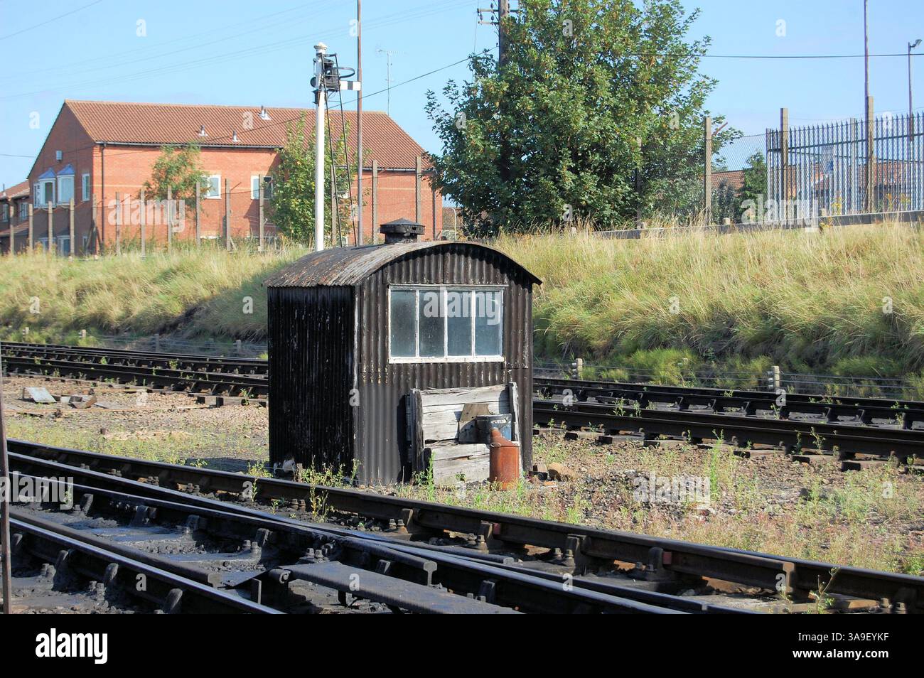 An old linemen's hut standing on the ballast between sets of railway ...