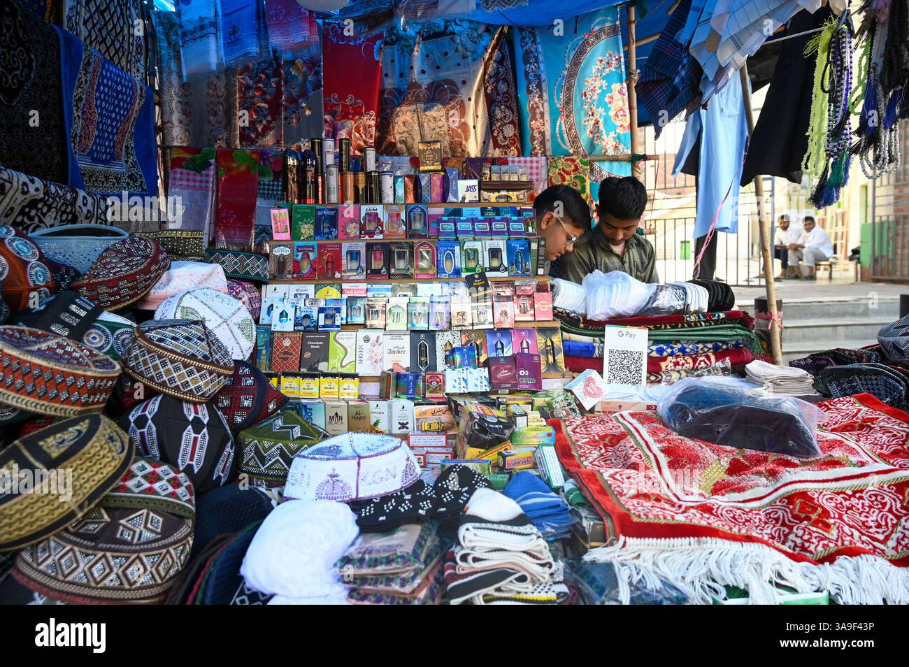 NOIDA, INDIA - MARCH 30: People shop at the Sector 8 market on the eve ...
