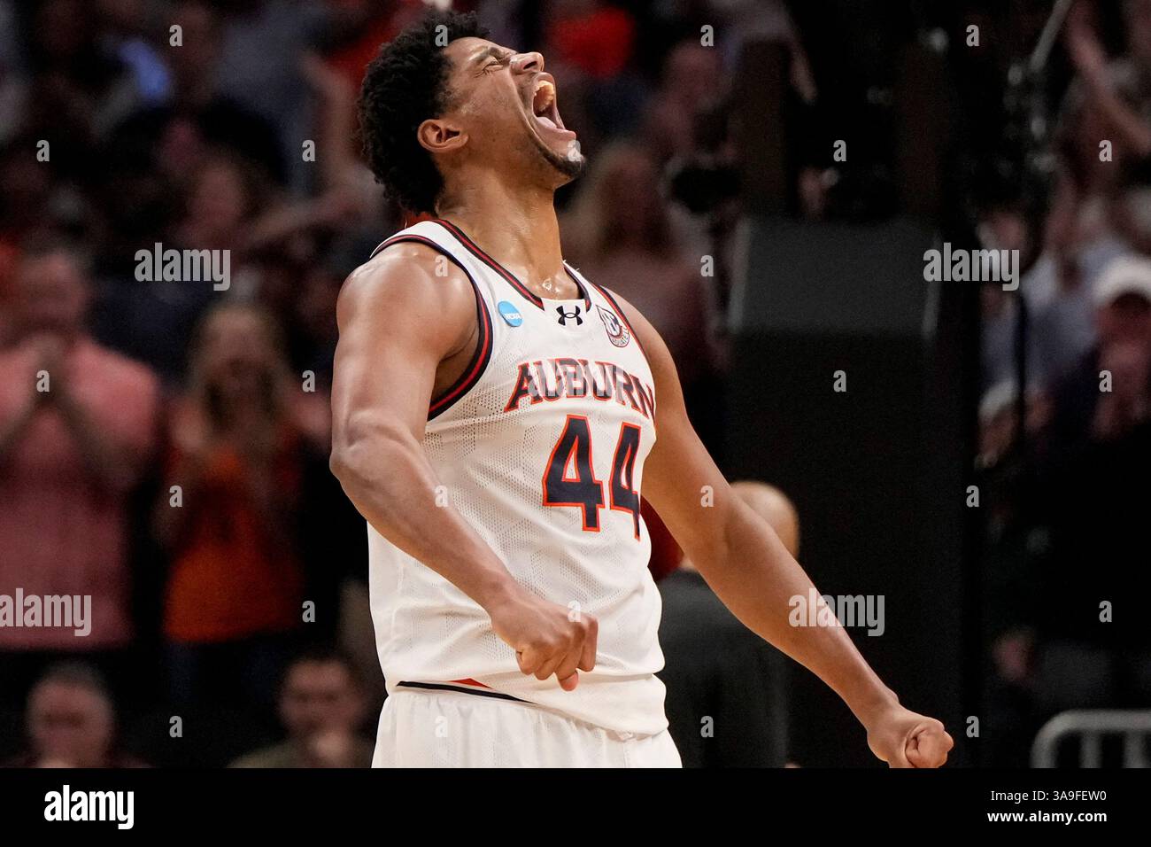 Auburn center Dylan Cardwell (44) reacts to a basket against Michigan ...