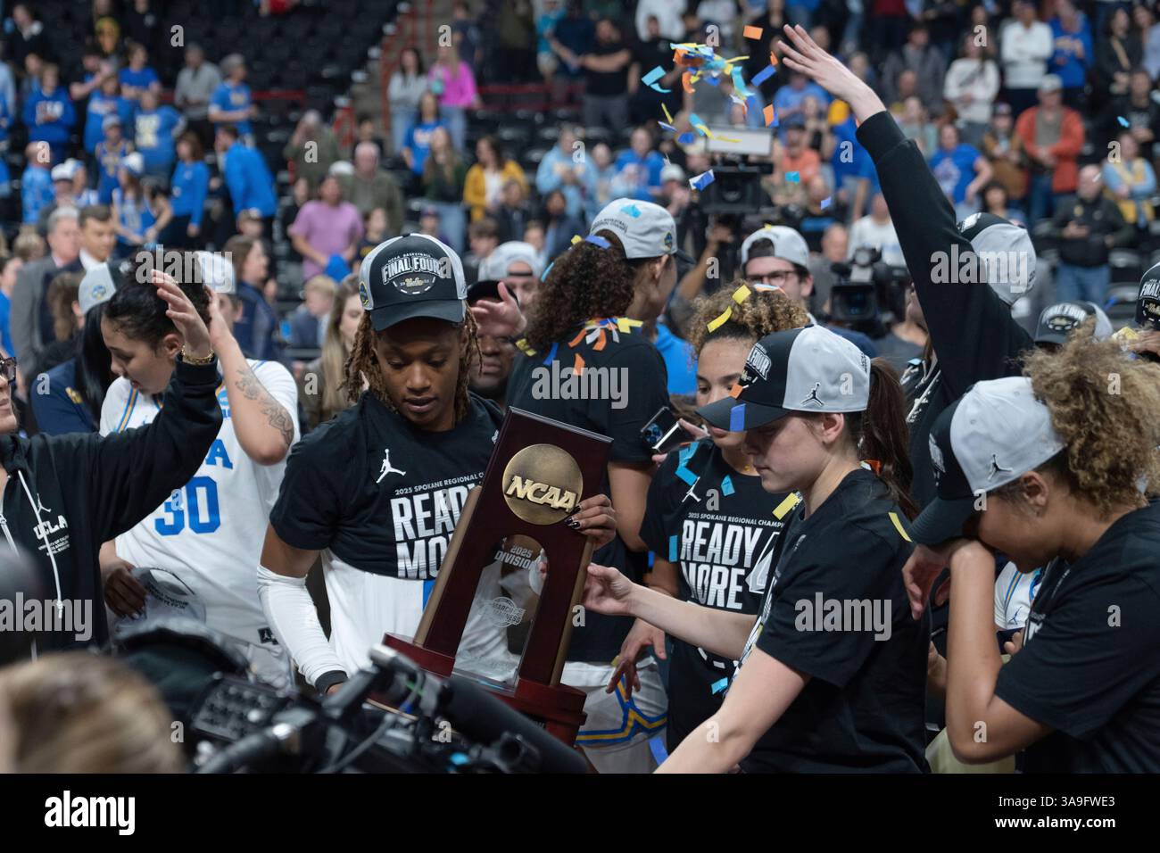 UCLA players celebrate after a game against LSU in the Elite Eight of ...