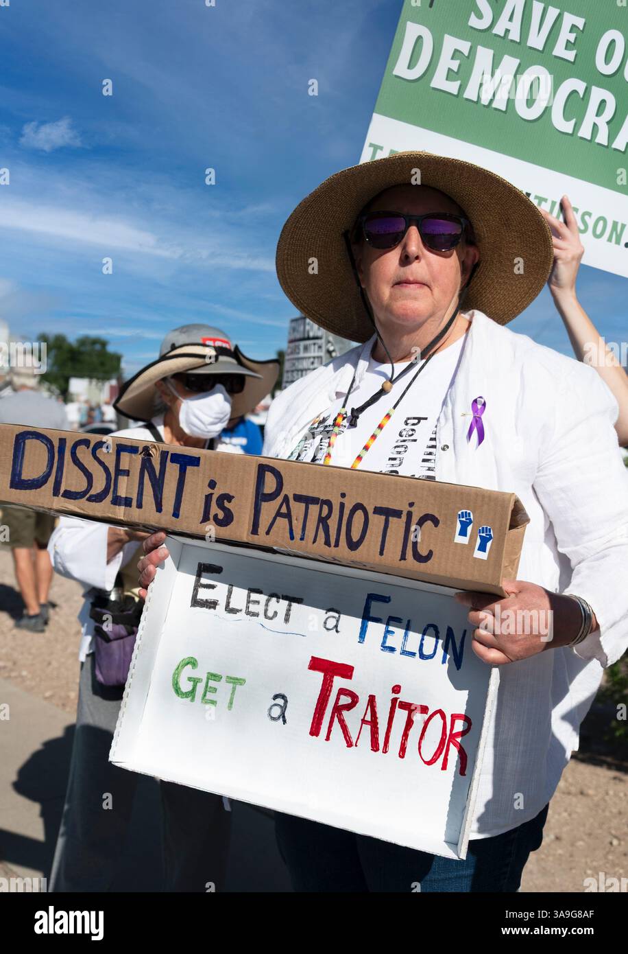 Protesters with placards deriding Elon Musk and Trump Administration's ...