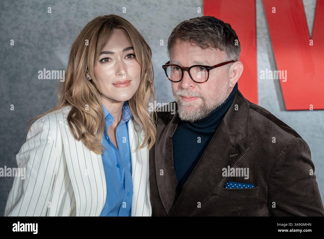 Jacqui Ainsley and Guy Ritchie attend the premiere of "MobLand" at ...
