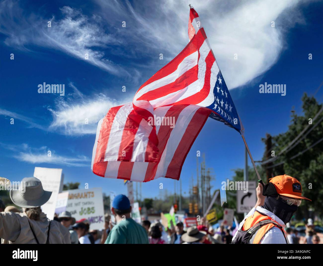 Protesters with placards deriding Elon Musk and Trump Administration's ...
