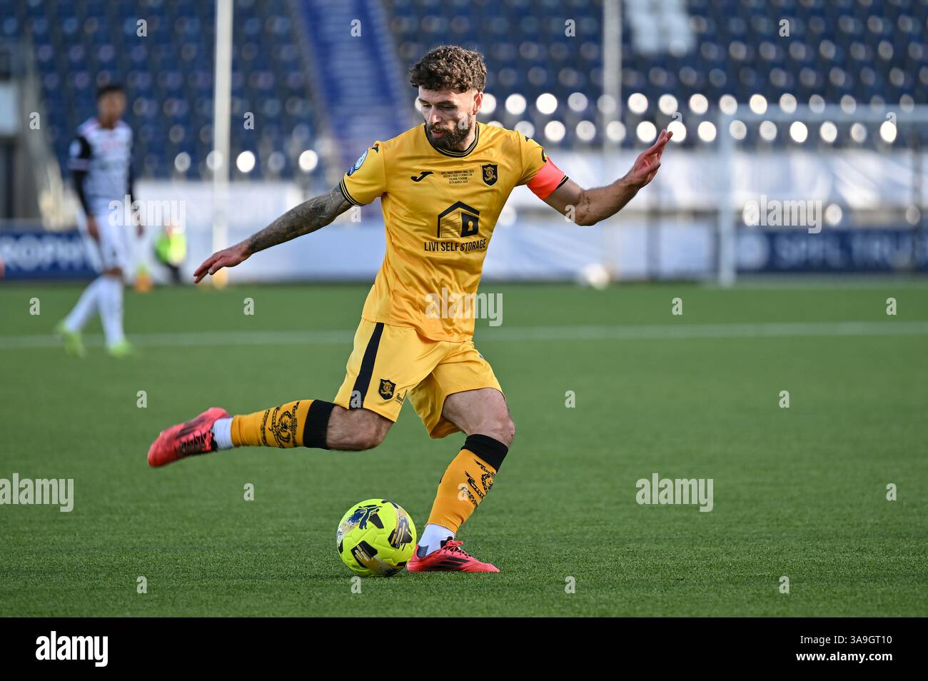 Falkirk, Scotland, UK. 30th March, 2025. Livingston captain Jamie ...