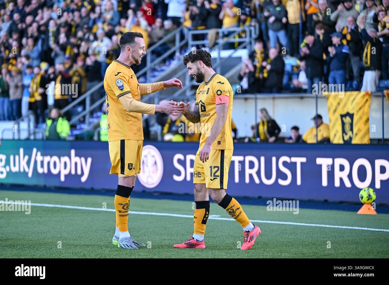Falkirk, Scotland, UK. 30th March, 2025. Livingston captain Jamie ...