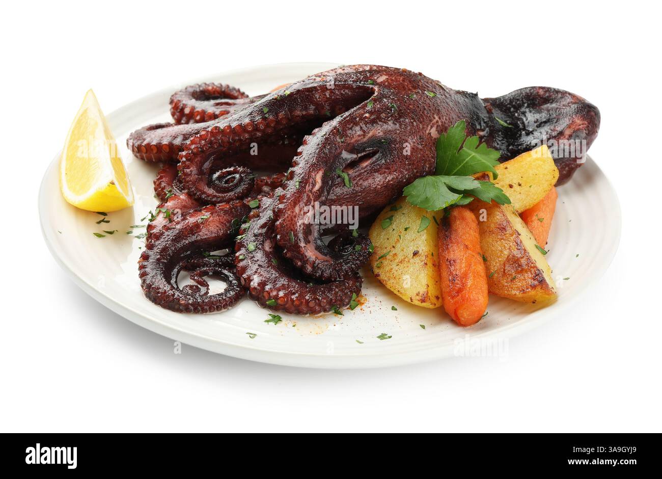 Roasted octopus with vegetables and lemon isolated on white Stock Photo ...