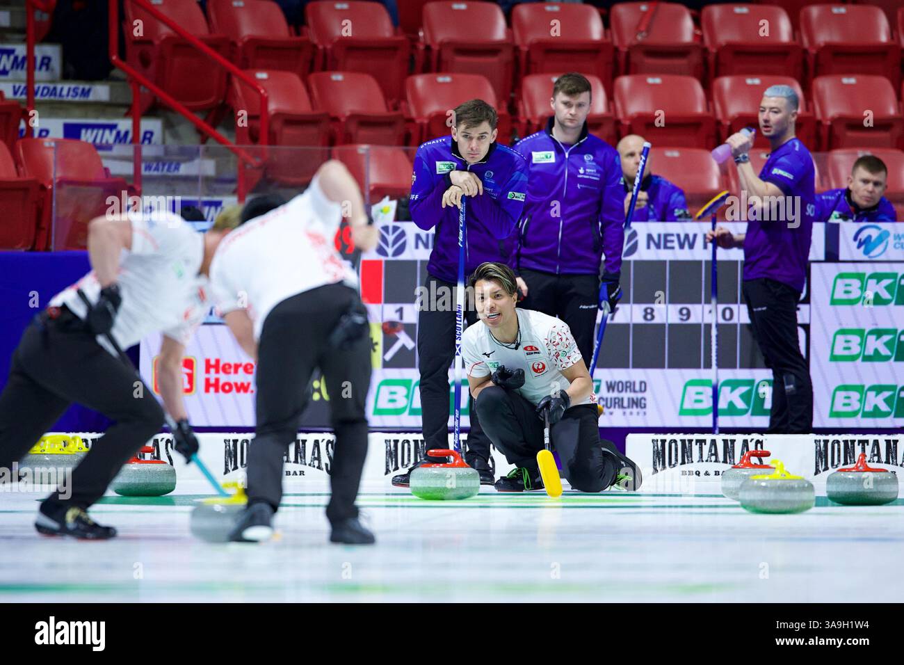 Yamaguchi Tsuyoshi yells instructions to his sweepers on day two of the 2025 World Men's Curling ...