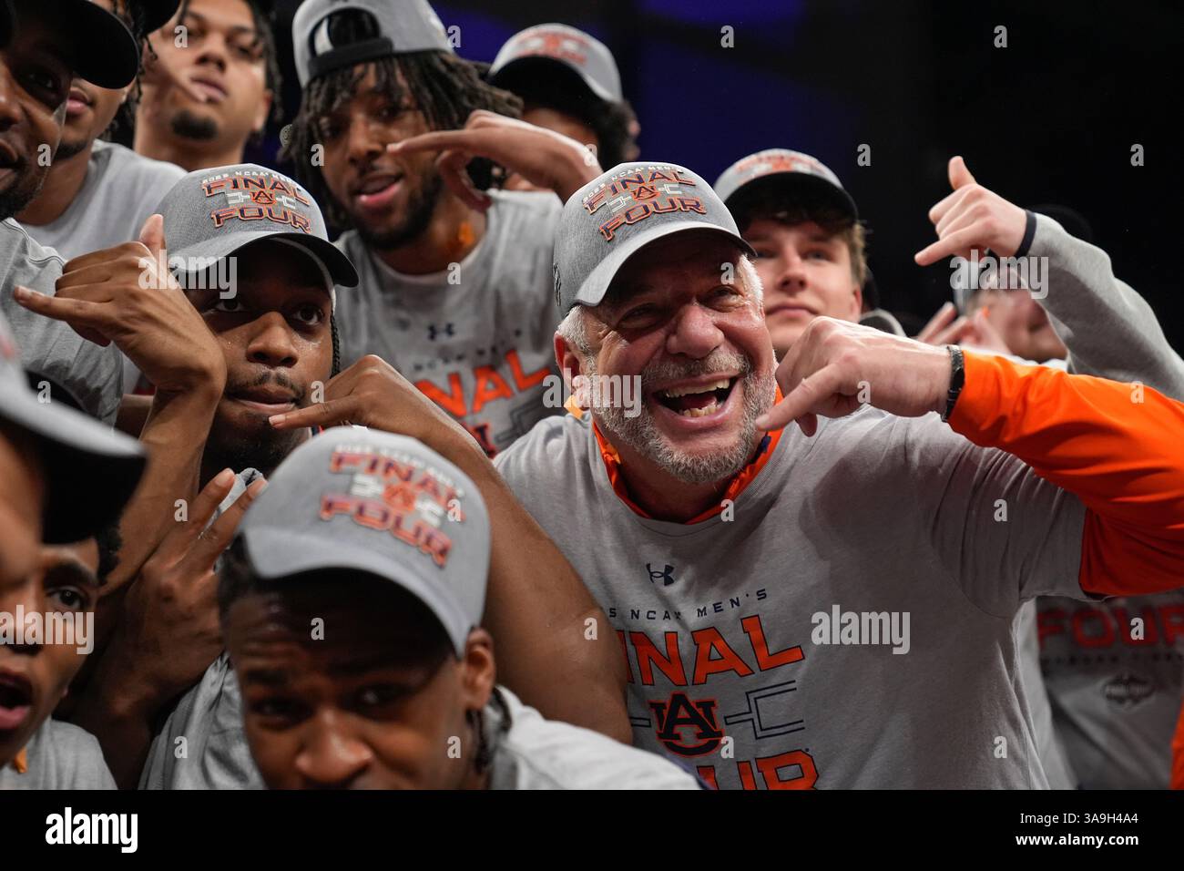 Auburn head coach Bruce Pearl celebrates with the team after the Elite ...