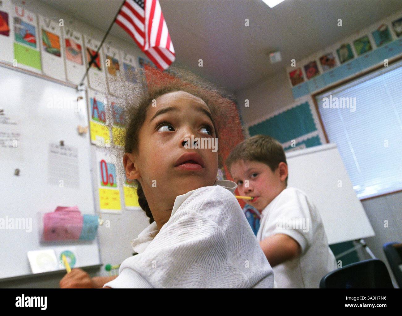 Second grade student Maurice Simon (cq) left, and classmate Colby Rojas ...
