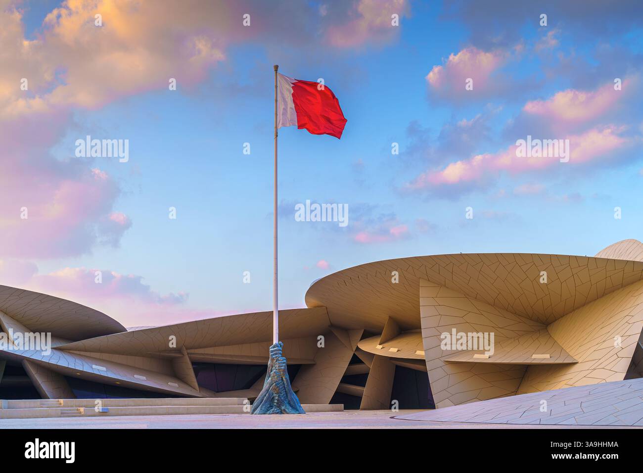 Doha, Qatar - Jan 06 2024, a view of flagpole with the flag of Qatar ...