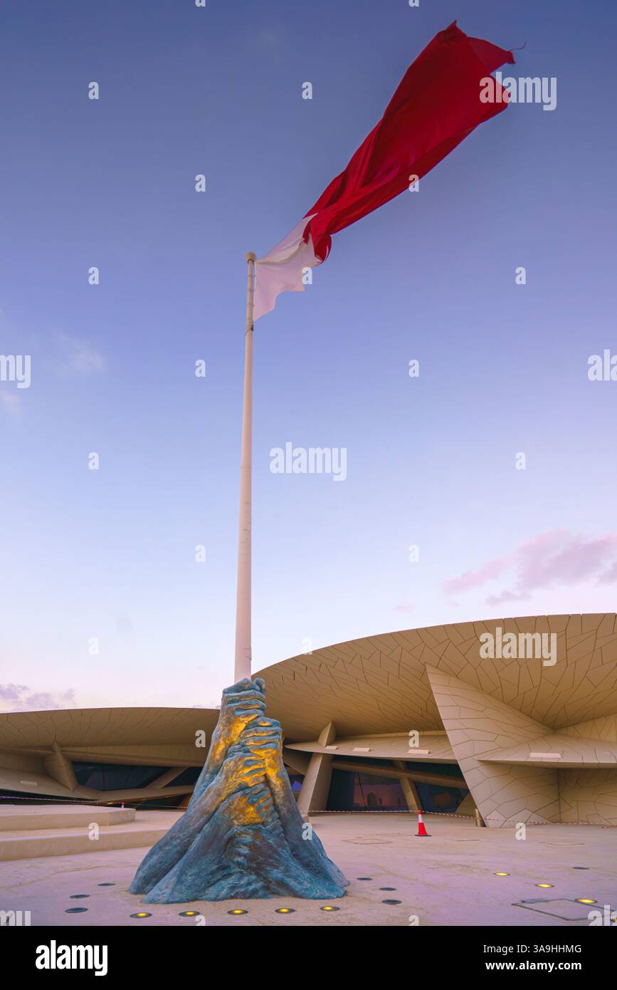 Doha, Qatar - Jan 06 2024, a view of flagpole with the flag of Qatar ...