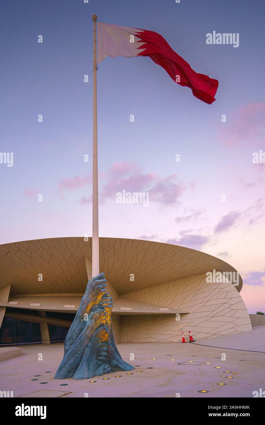 Doha, Qatar - Jan 06 2024, a view of flagpole with the flag of Qatar ...