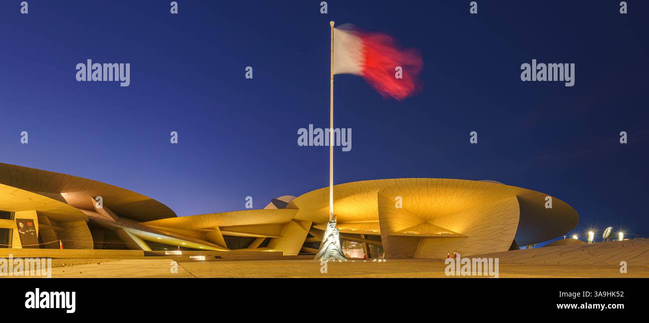 Doha, Qatar - Jan 06 2024, a panoramic view of fluttering Qatar flag in ...