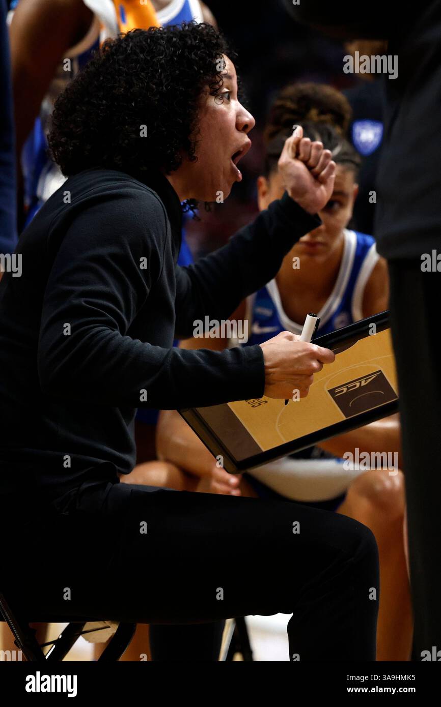 Duke head coach Kara Lawson speaks to players in a timeout during the ...