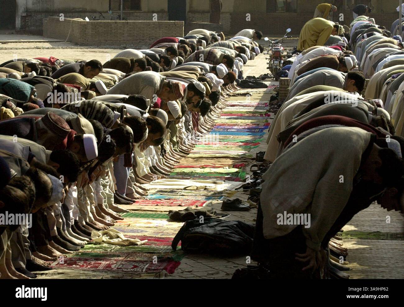Jan 18, 2002; Islamabad, Pakistan; Pakistani muslims bow to pray ...