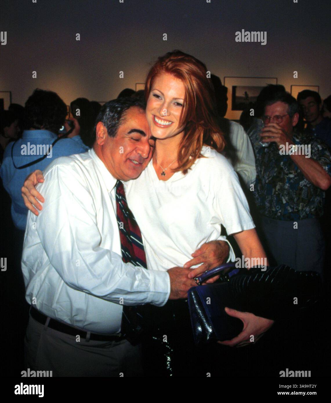 Oct 16, 1997; Los Angeles, CA, USA; model ANGIE EVERHEART turns the ...