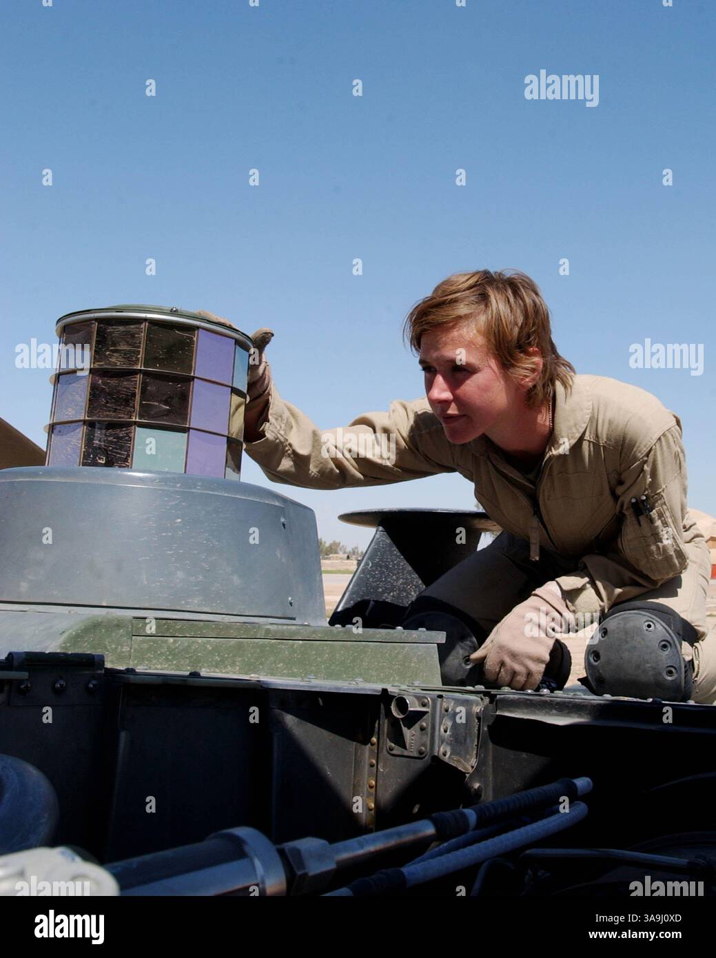 Apr 04, 2005; Balad Air Base, Iraq; A1C Melody Boates conducts a ...