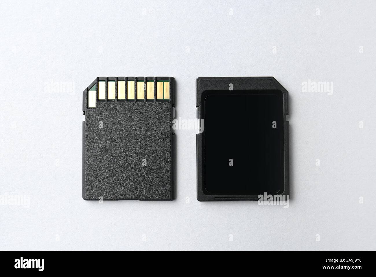 Two SD memory cards on white background, flat lay Stock Photo - Alamy