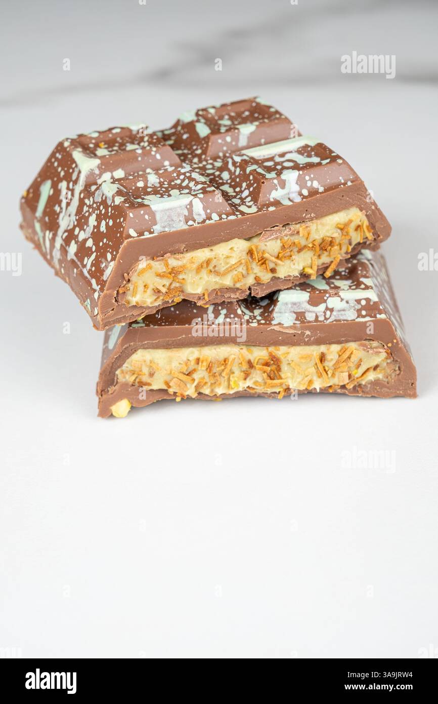 Handmade Belgian chocolate bar with pistachios and filled with ganache ...