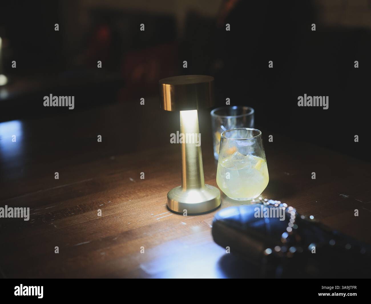 An aesthetic and ambient bar scene featuring drinks alongside a ...