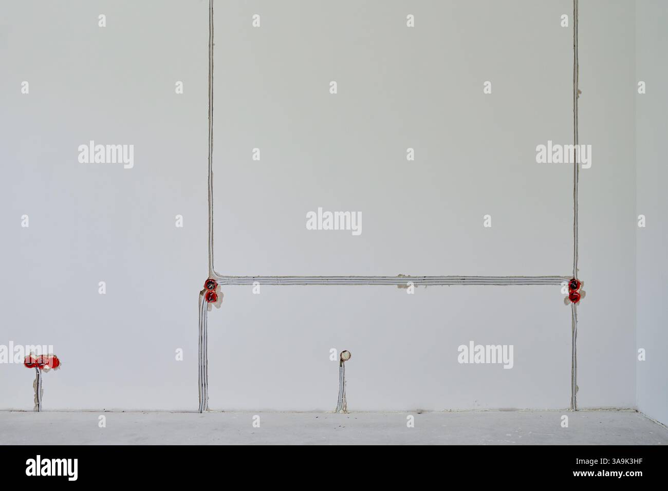 Electrical sockets and cables in unfinished wall during renovation ...