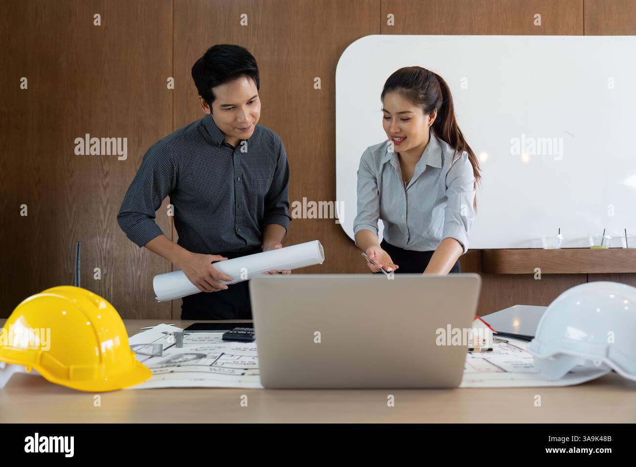 Engagement and Collaboration. A detailed discussion between engineers ...