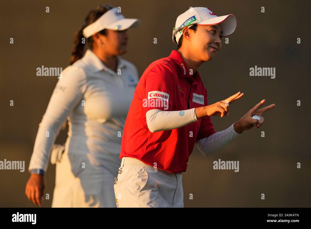 Hyo Joo Kim, of South Korea, celebrates after winning on the 18th green ...
